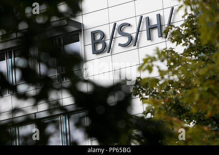 A logo sign outside of the headquarters of BSH Hausgeräte GmbH (BSH ...