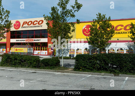 A logo sign outside of a Poco (Eigenschreibweise POCO) retail store in ...