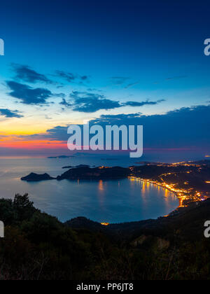 Agios Georgios beach at paradise bay in beautiful mountain scenery ...