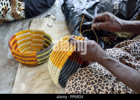 Aboriginal woman weaving a traditional pandanus mat in Arnhem Land ...