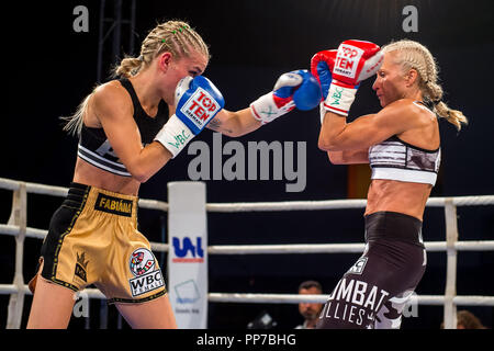 Czech professional boxer Fabiana Bytyqi (left) defeats Denise Castle ...