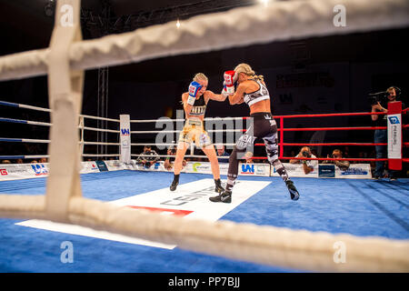 Czech professional boxer Fabiana Bytyqi (left) defeats Denise Castle ...