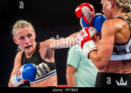 Czech professional boxer Fabiana Bytyqi (left) defeats Denise Castle ...