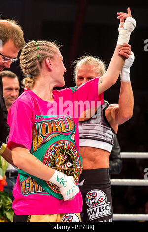 Czech professional boxer Fabiana Bytyqi (left) defeats Denise Castle ...