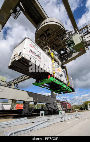 24 September 2018, Bavaria, Munich: A craneable semi-trailer is ...