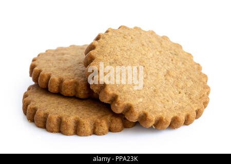 Three round gingerbread biscuits isolated on white from above. Serrated ...