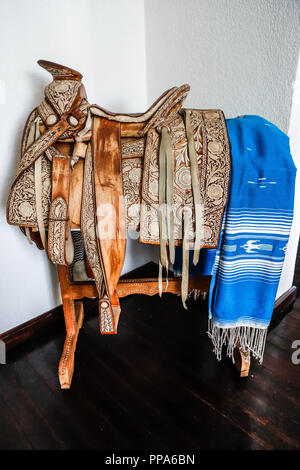 Zarape of blue color and Saddle. Decoration of the interiors of the ...