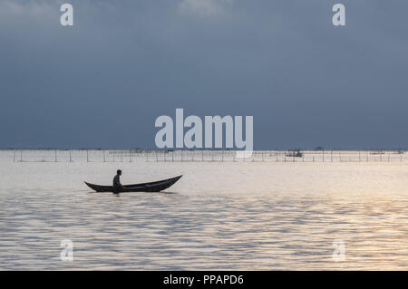 small fishing boats refection on the fjord Stock Photo - Alamy