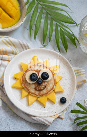 Funny Flower Pancake with berries for kids Stock Photo - Alamy