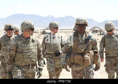 Maj. Gen. Mark Schindler, right, acting adjutant general of ...