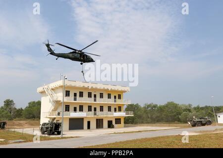 PENANJONG GARRISON, Brunei— A Soldier with the 1st Battalion, Royal ...