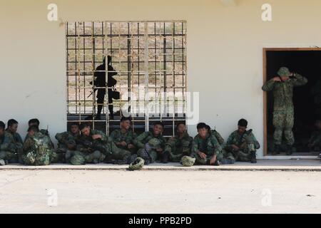 PENANJONG GARRISON, Brunei— A Soldier with the 1st Battalion, Royal ...