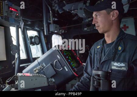 US Navy Chief Quartermaster navigates the Utility Landing Craft (LCU ...