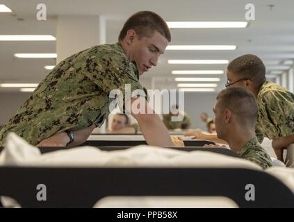 GREAT LAKES, Ill. (Aug. 16, 2018) Recruits eat lunch in the USS ...