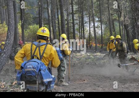 Hotshots assigned to the U.S. Forest Service patrol the U.S. Air Force ...