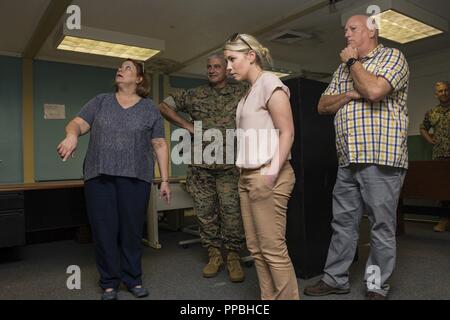 The Honorable Caral E. Spangler, left, assistant deputy commandant for ...