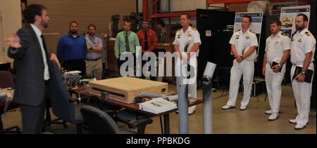 Royal Australian Navy (RAN) Commodore Ivan Ingham (center), Commodore ...