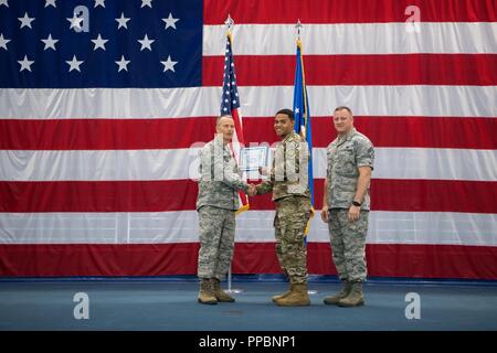 Barksdale personnel are recognized for their promotions during a ...