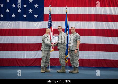 Barksdale personnel are recognized for their promotions during a ...