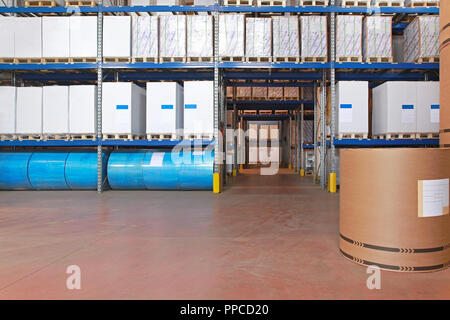 Distribution warehouse with paper rolls and material for printing Stock ...