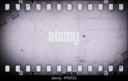 Grunge gray scratched dirty film strip with movie reel background Stock ...