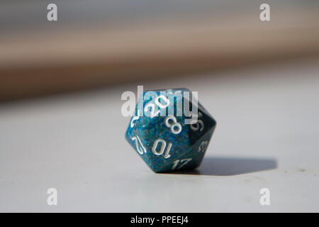 A D20 used for critical roll in tabletop role-playing game Dungeons and ...