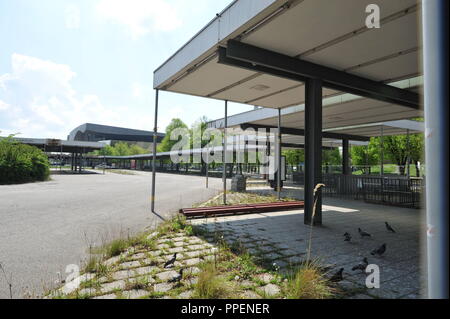 Ramshackle former bus terminal at the Olympiazentrum U-Bahn station ...