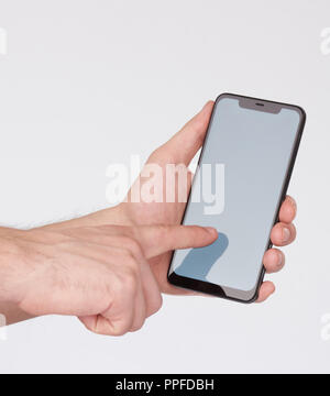 Front frame of smartphone with notch isolated on white studio ...