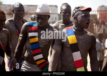 BOR, SOUTH SUDAN-DECEMBER 4, 2010: Unidentified Dinka tribesmen wrestle ...
