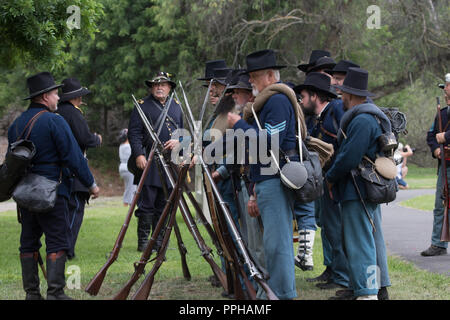 Union soldiers during a battlefield scene from the American Civil war ...