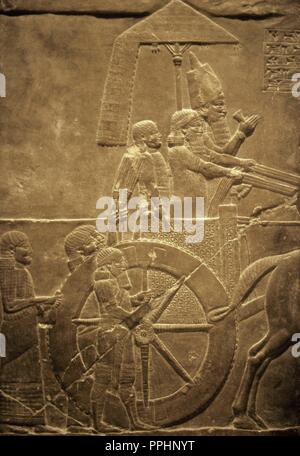 Palace of Ashurbanipal, Nineveh, Iraq. Ashurbanipal with his subjects ...