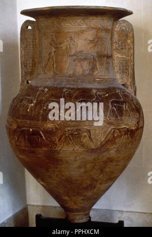 Perseus (left, wearing a hat, winged boots and the kibisis slung over ...