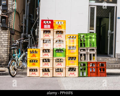 Japanese beer plastic crates Stock Photo - Alamy