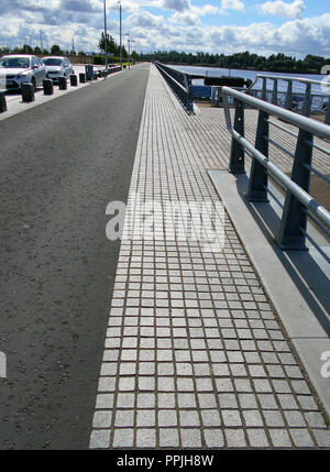 A section of the Clyde Walkway cycle path washed away by erosion of the ...