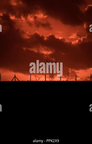 Cinematic horror scenario, deep red sky, with massive black clouds ...