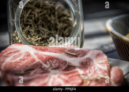 raw meat with herbs and rosemary ready for barbecue Stock Photo - Alamy