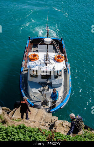 The Dale Princess at the landing stage on Skomer Island, Pembrokeshire ...