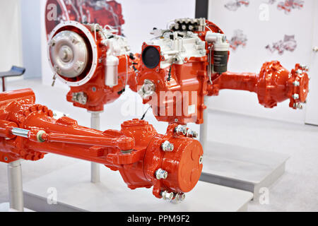 Front and rear axles for backhoe loaders and transmission systems Stock ...