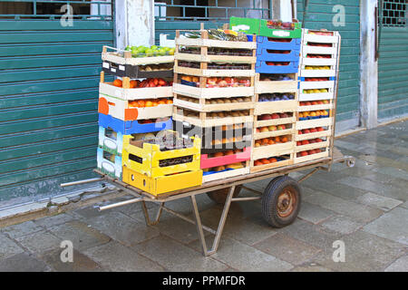 Crates with fruits and vegetables at hand cart Stock Photo - Alamy