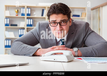 Businessman expecting important call on phone Stock Photo - Alamy