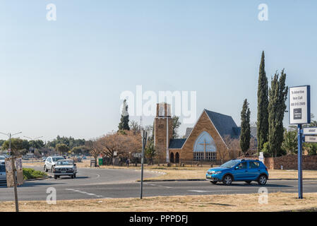 WELKOM, SOUTH AFRICA, AUGUST 2, 2018: A street scene, with the clock ...