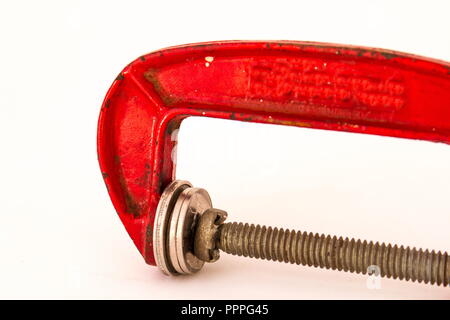 The squeeze on retirement savings for the elderly conceptual image with ...