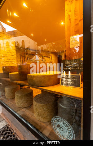 Cheese rounds in a cheese shop window. Strasbourg, France Stock Photo ...