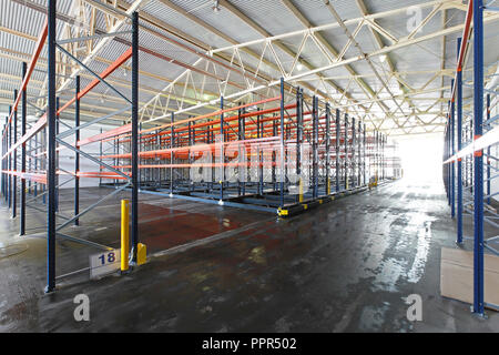 Mobile roller racking system in distribution warehouse Stock Photo ...