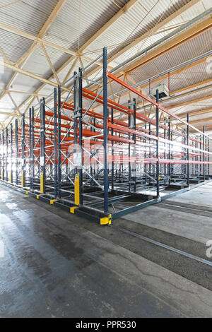 Distribution warehouse with mobile shelving system Stock Photo - Alamy