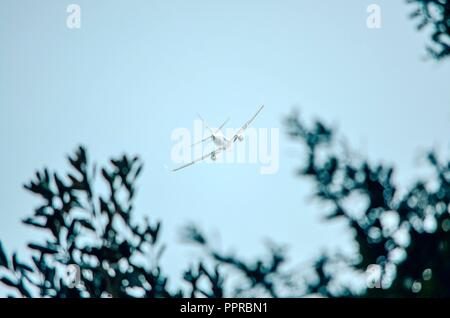 Low angle view of flight departure of jet plane in cloudy sky Stock ...