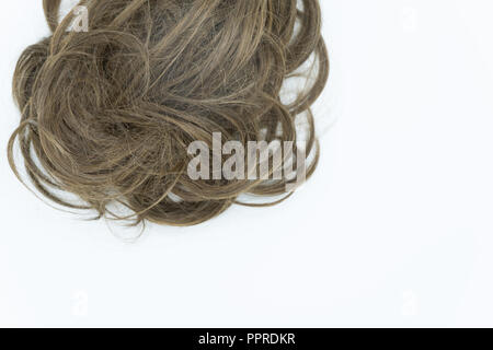 Brunette curly hair tuft isolated on white background Stock Photo - Alamy
