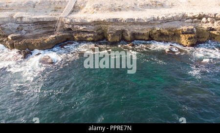 Beating the rock sea wave. Surf, waves, extreme sports Stock Photo - Alamy