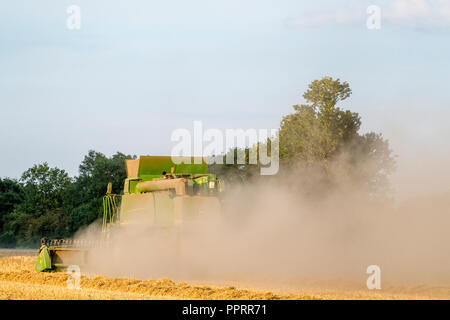 Rural environmental issues. Air pollution in the countryside. Combine ...