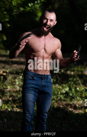 Superhero With Claws Standing Strong Flexing Muscles - Muscular ...